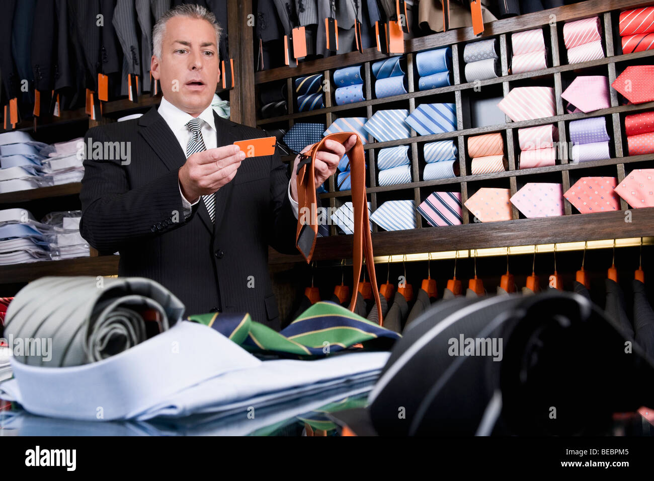 Customer checking shirt fabric hi-res stock photography and images - Alamy