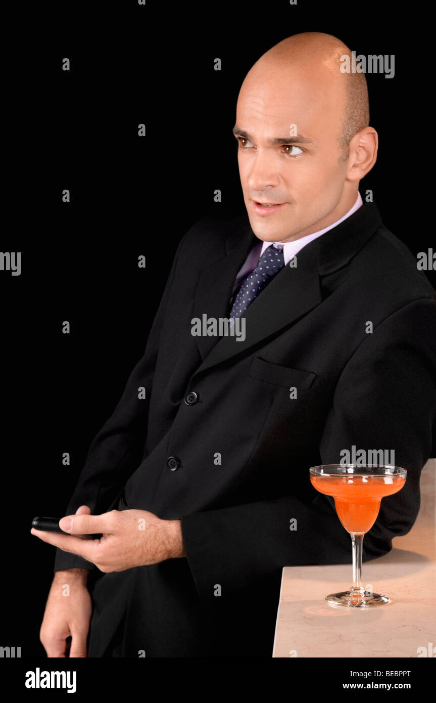 Businessman in a bar Stock Photo - Alamy