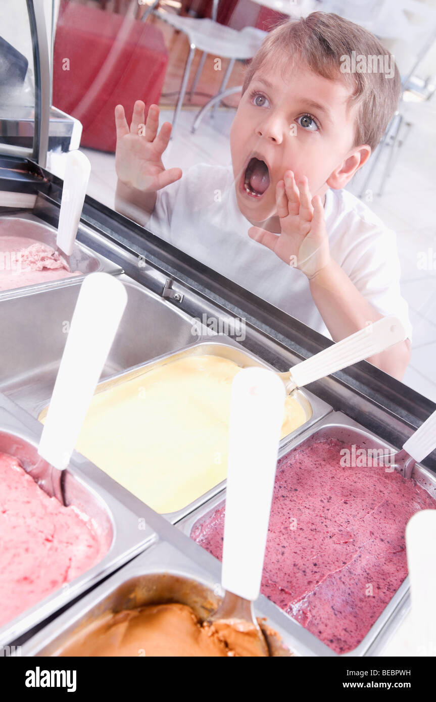 Boy choosing ice cream in an ice cream parlor Stock Photo - Alamy