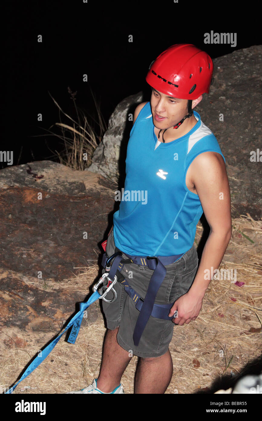 Protective gears for climbing cliffs at night time hi-res stock ...