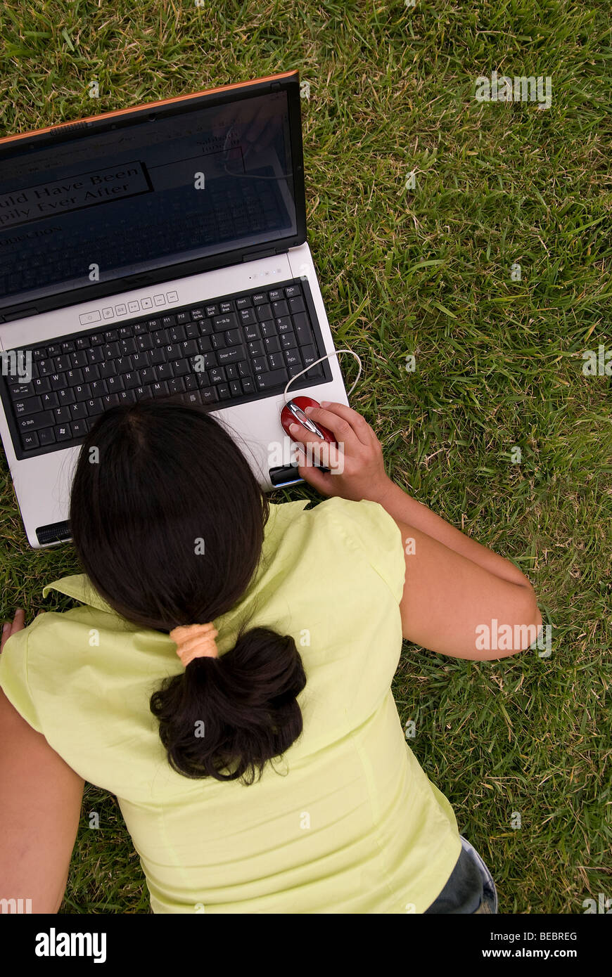 Young woman with laptop computer Stock Photo - Alamy