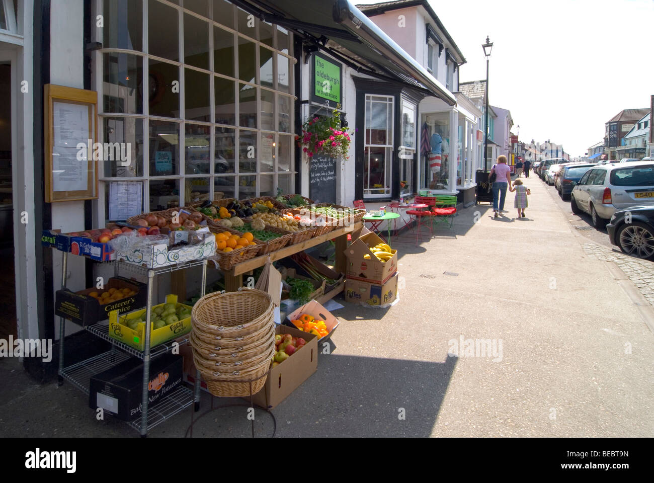 traditional grocery store with fruit and vegetables on display outside ...