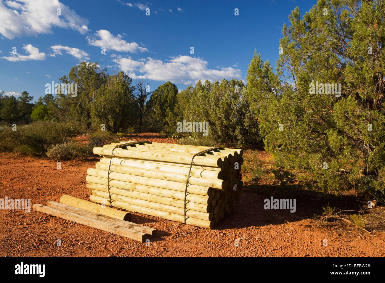 Stack of logs in a field, Sedona, Arizona, USA Stock Photo - Alamy
