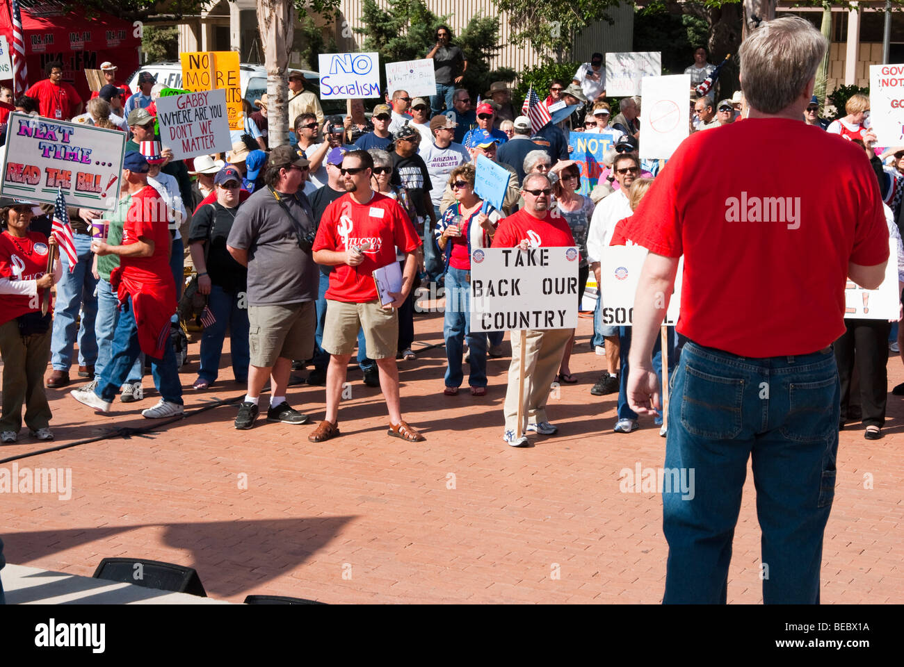 citizens protesting government policies at a Tea Party rally in Arizona ...
