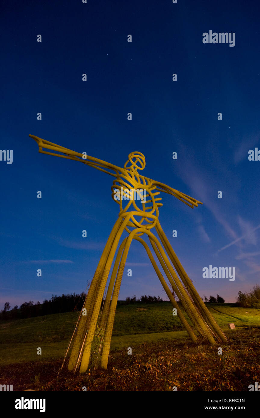 The 'Green Man' statue at the north entrance to Buckshaw Village Stock ...