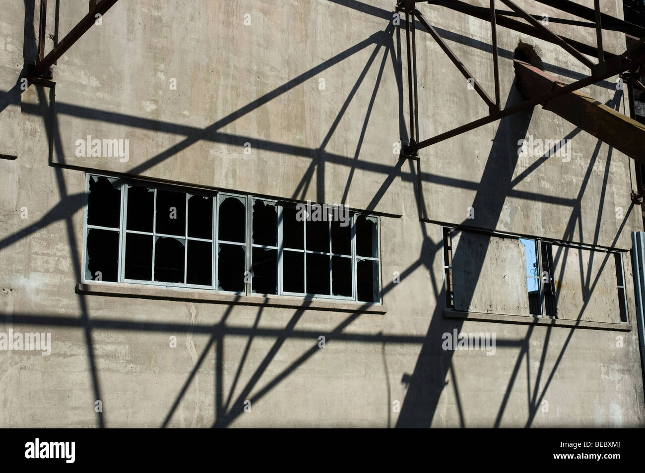 An old canopy frame casts shadows on the wall at Ditherington Flax Mill ...