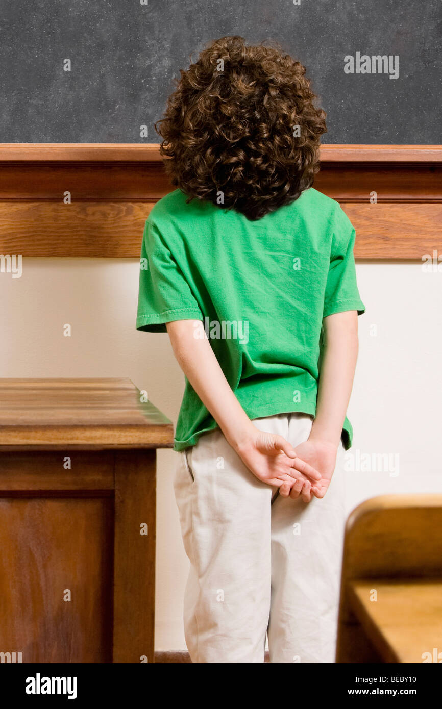 Back view schoolboy in hi-res stock photography and images - Alamy