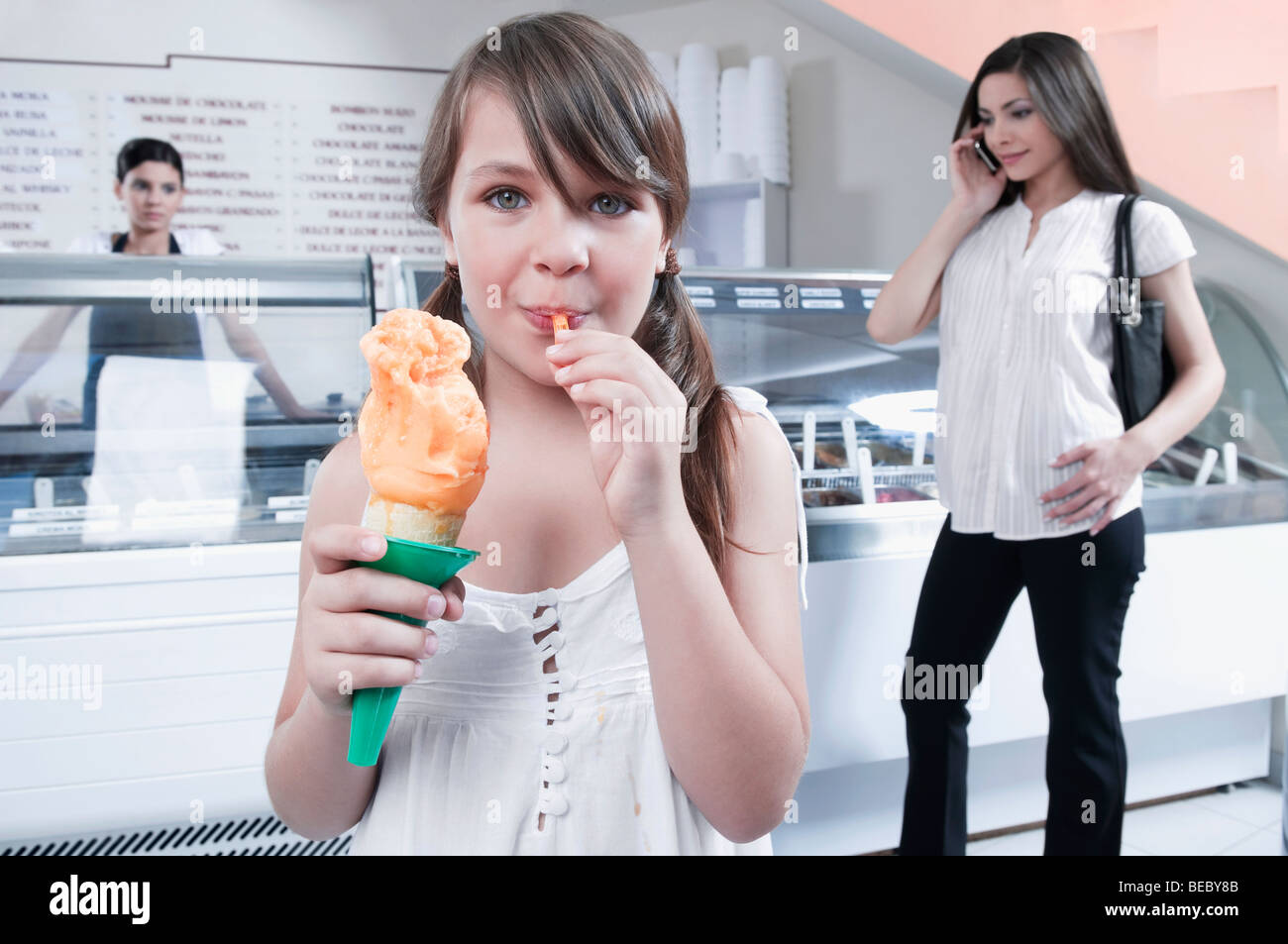 Hispanic girls eating ice cream hi-res stock photography and images - Alamy