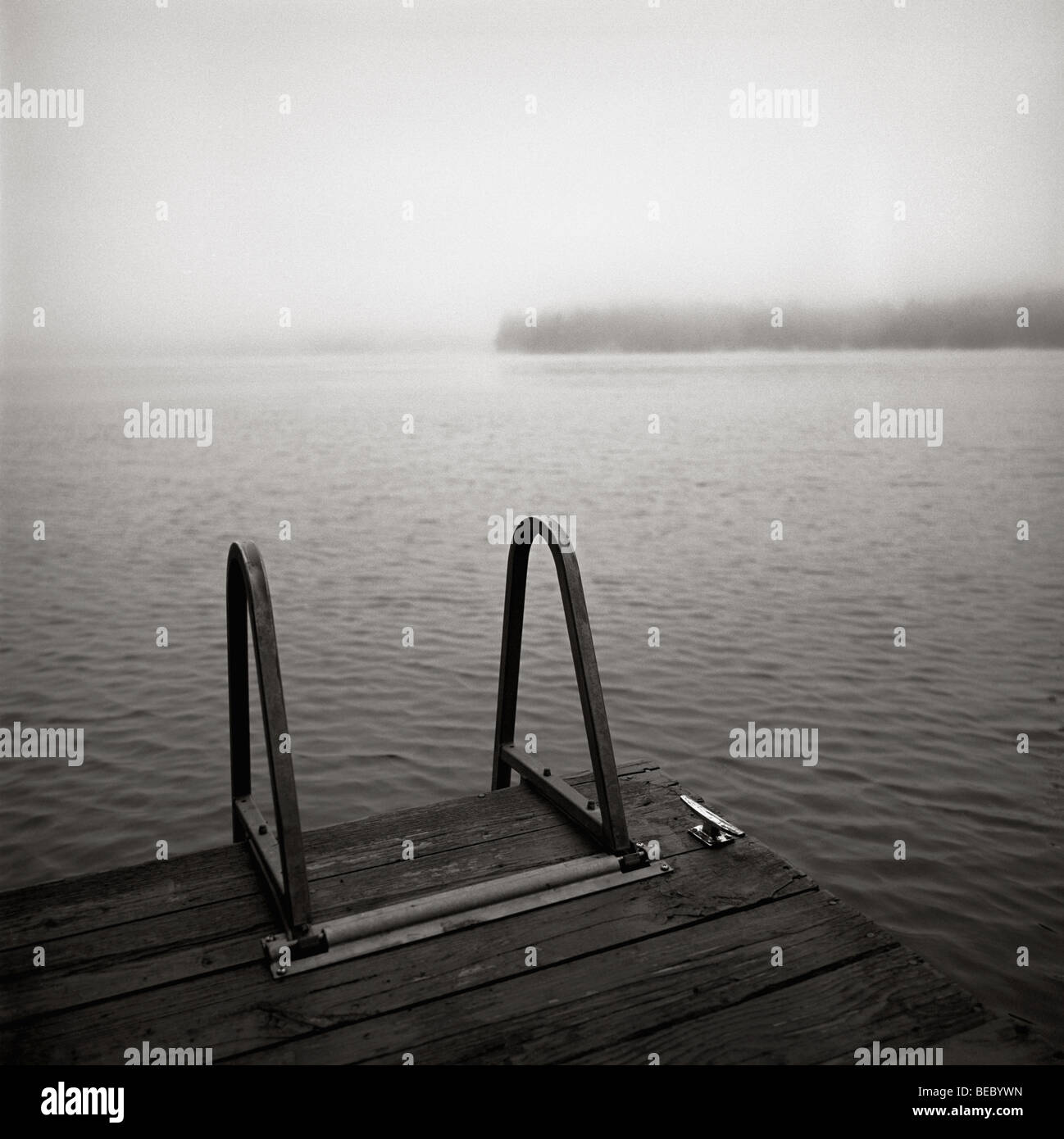 Jetty with stairs in the sea Stock Photo - Alamy