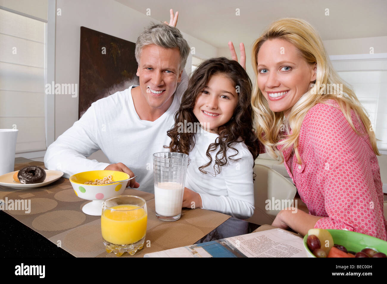 Family having breakfast Stock Photo - Alamy