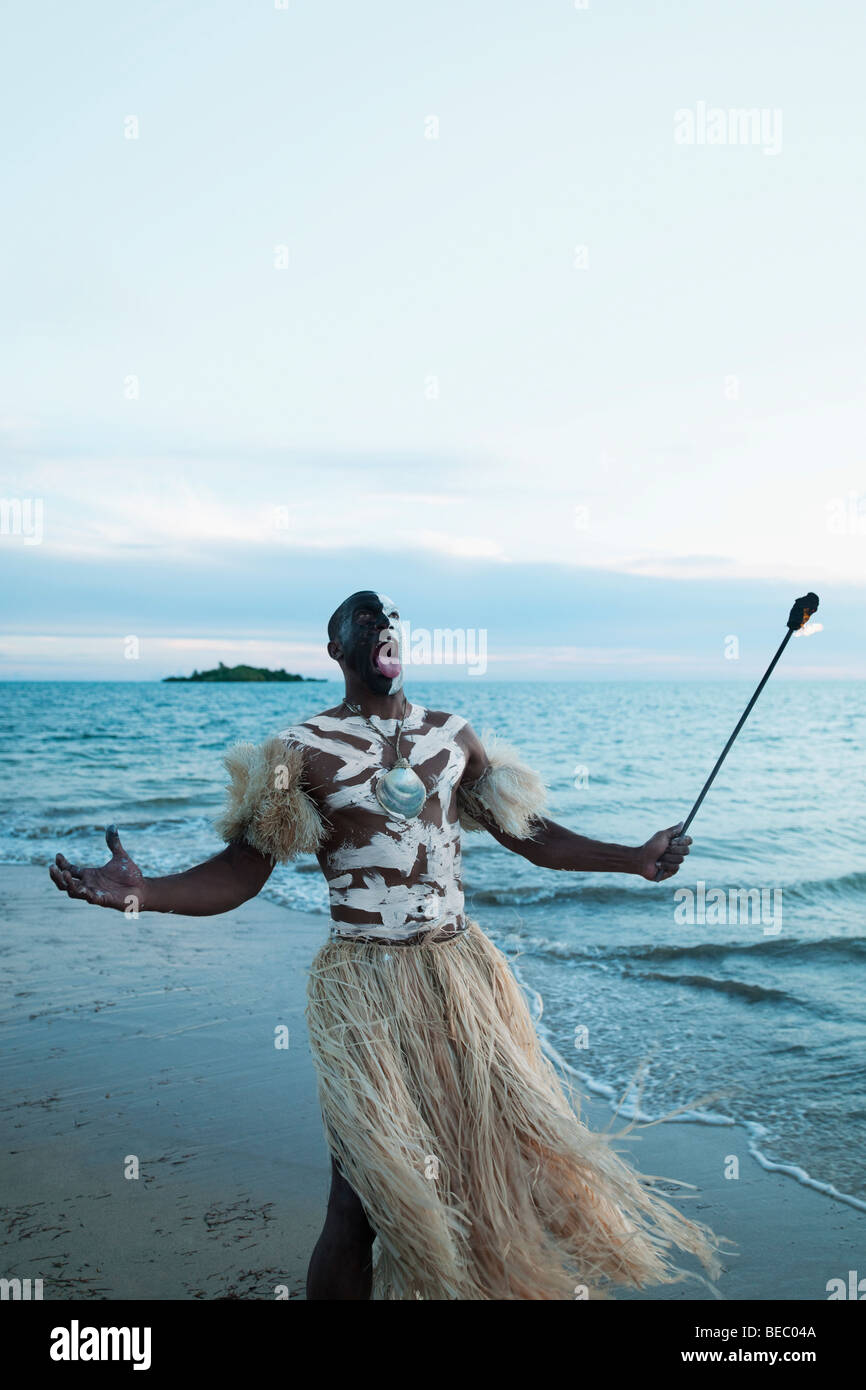 Tribesman looking angry on the beach Stock Photo - Alamy