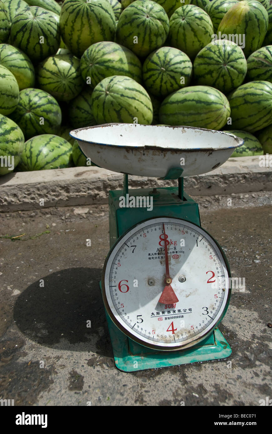 Fruit scale on a market of Kasghar, Xinjiang Province, China Stock ...