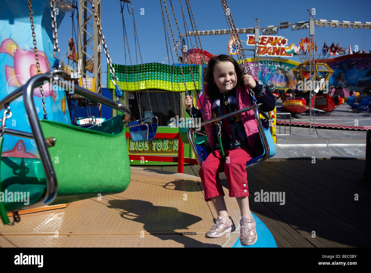 Girl on a fairground ride Stock Photo - Alamy