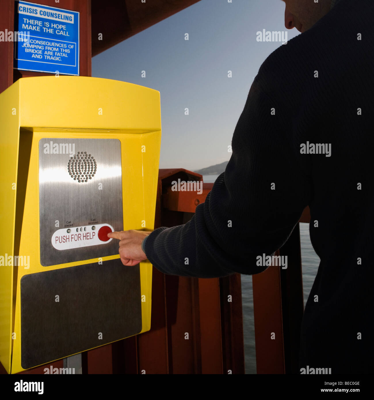 Tourist Pressing Emergency Call Button On A Bridge Golden Gate Bridge
