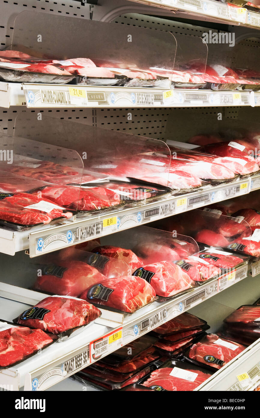 Red meat packets in a supermarket Stock Photo - Alamy