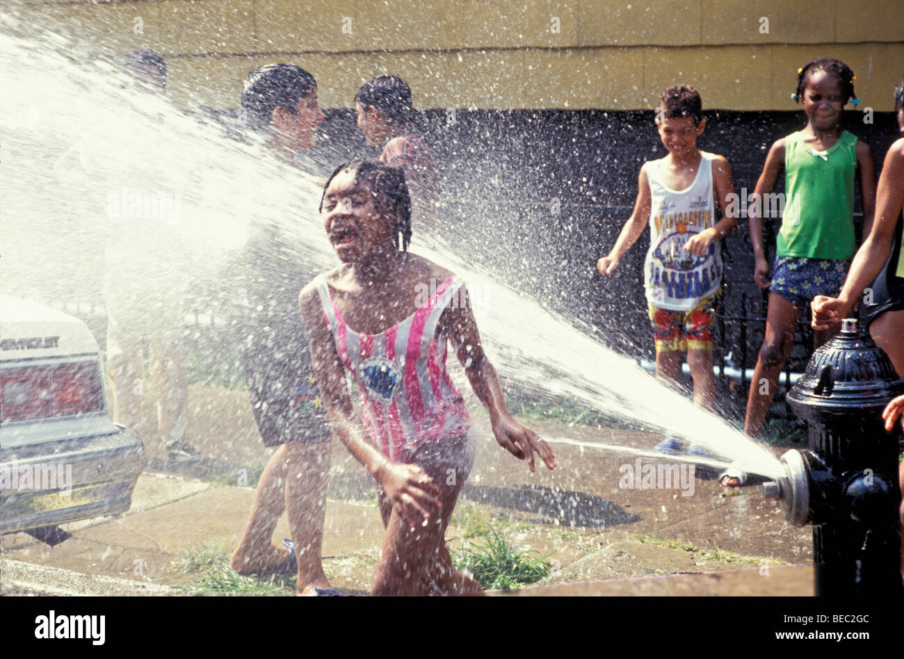 Cooling off on a hot summer day in Brooklyn, New York. MR Stock Photo ...