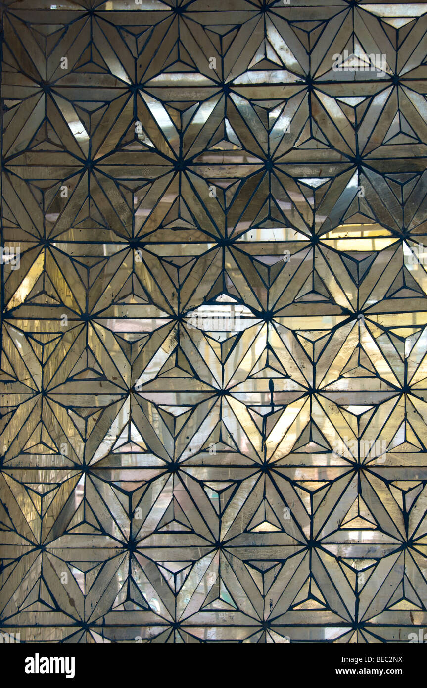 Patterns made from glass on a burmese temple wall in Myawaddy, Burma ...