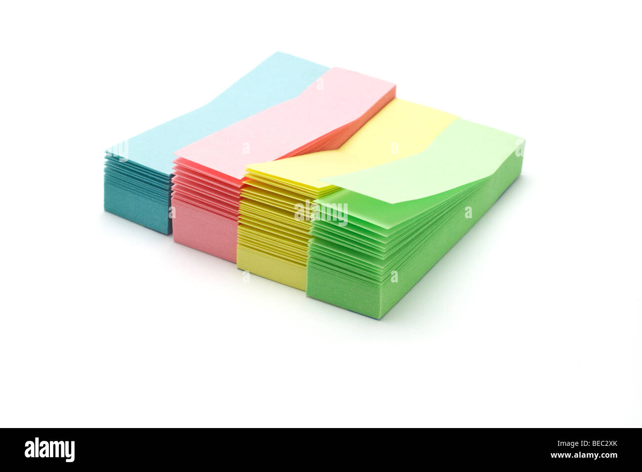 stacks of colorful narrow sticky packs on white Stock Photo - Alamy