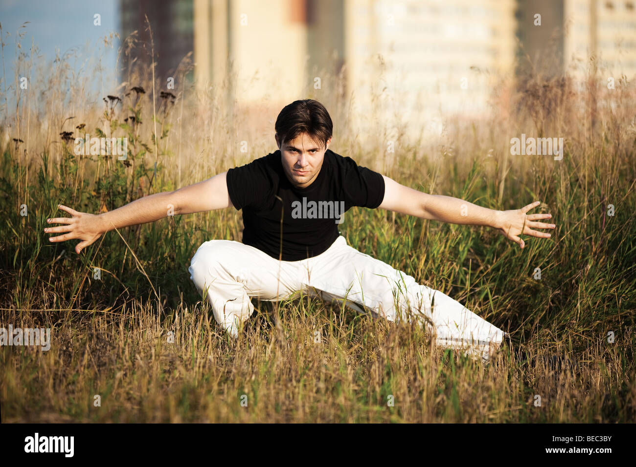 Young athletic man martial art training. Contrast colors Stock Photo ...