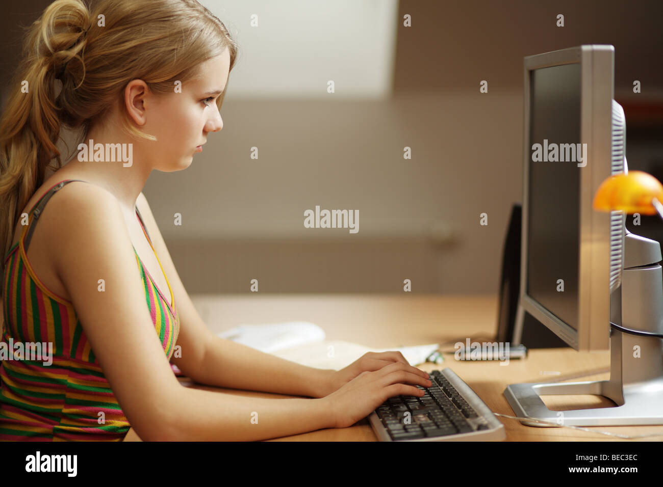Teenager girl using PC Stock Photo - Alamy