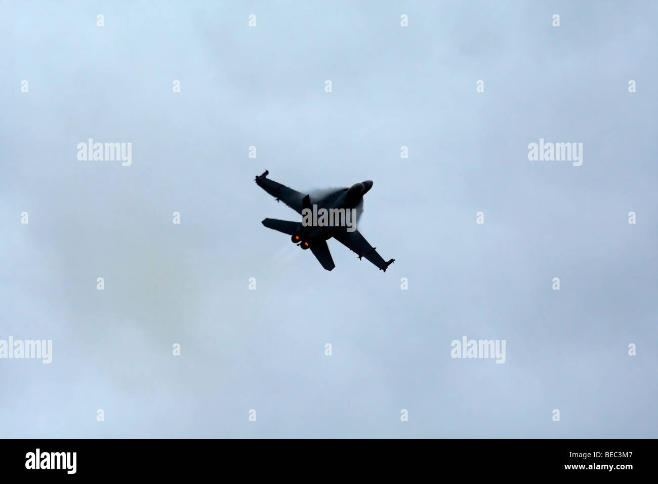 F/A-18 Super Hornet Jet Fighter in a Steep Climb with Vapour ...