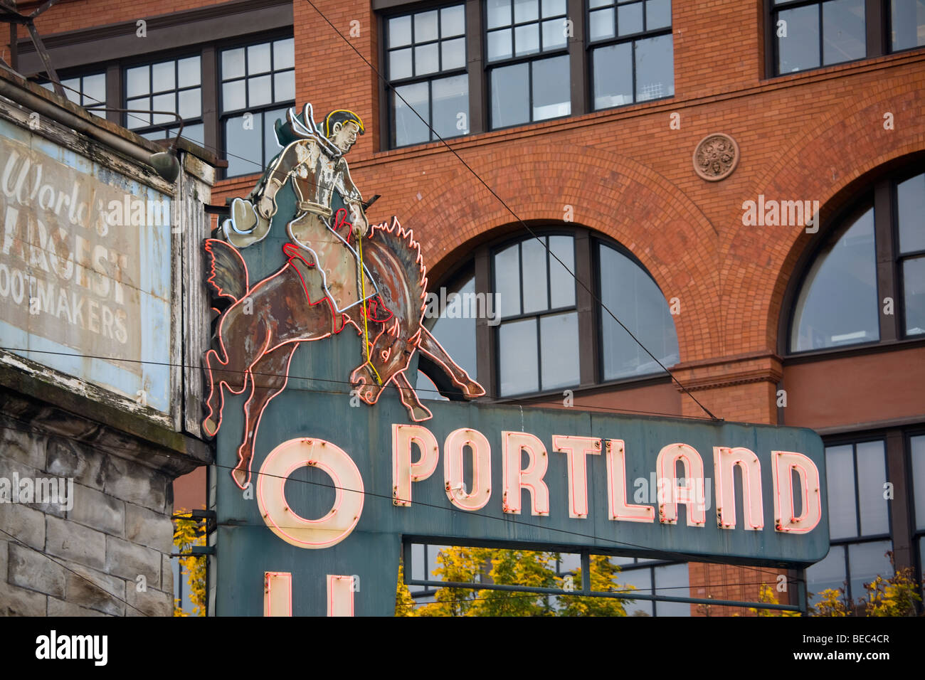 Neon cowboy sign in Portland, Oregon, USA Stock Photo - Alamy