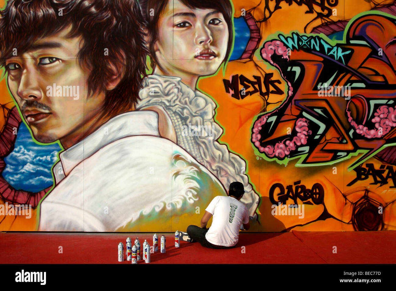 Artist painting mural at Graffiti Festival, Jinju Fortress, South Korea ...
