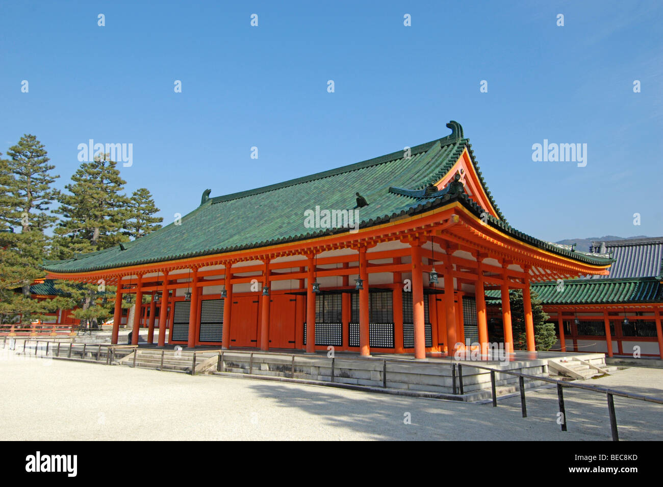 Vermilion building with blue skies and wispy cloud at Heian Jingu ...