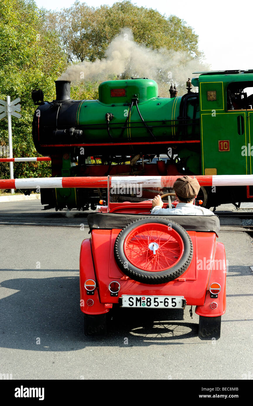 Steam Locomotive coal tank engine railway station with Aero veteran car ...