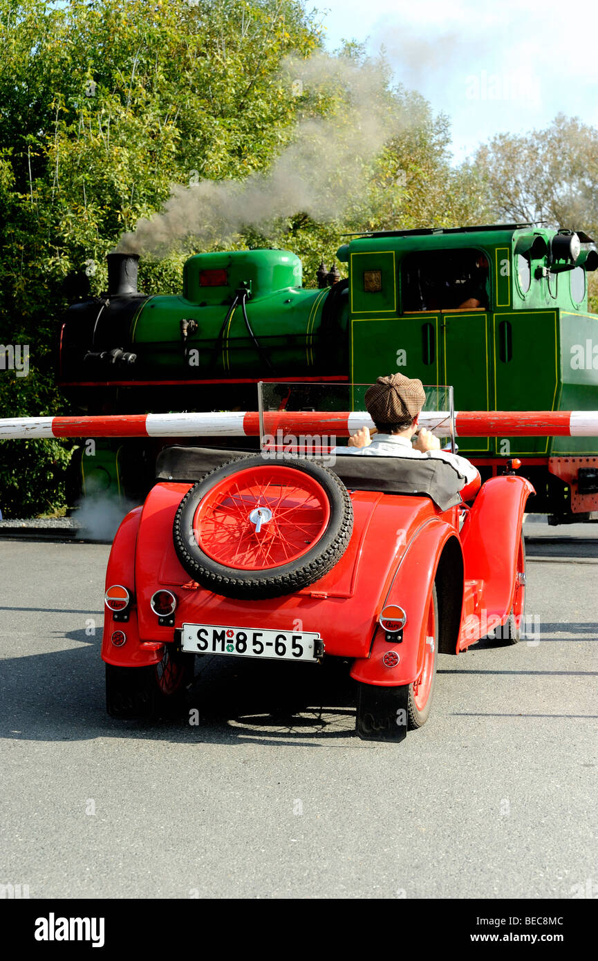 Steam Locomotive coal tank engine railway station with Aero veteran car ...