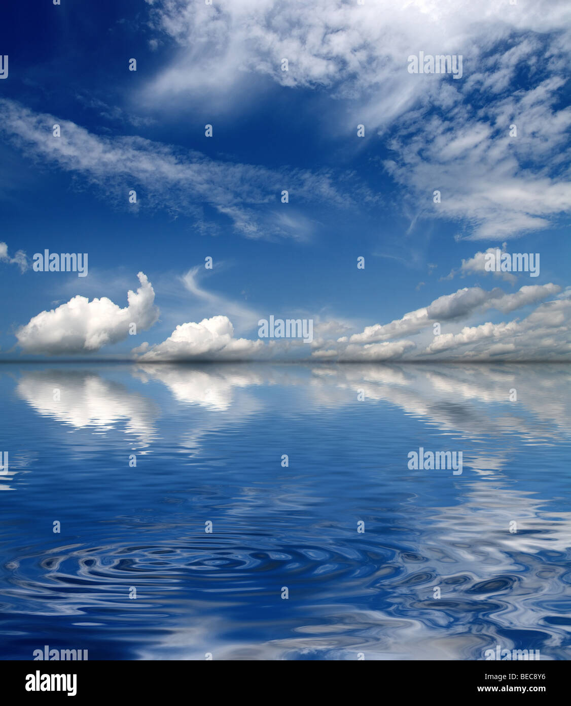 blue sky with clouds over sea background Stock Photo - Alamy