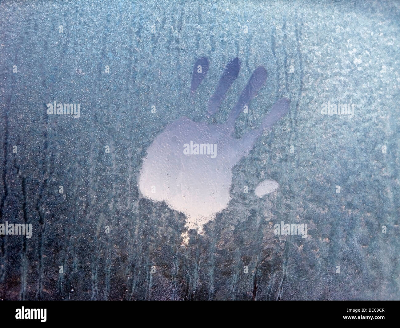 Handprint on a frosty car window Stock Photo - Alamy