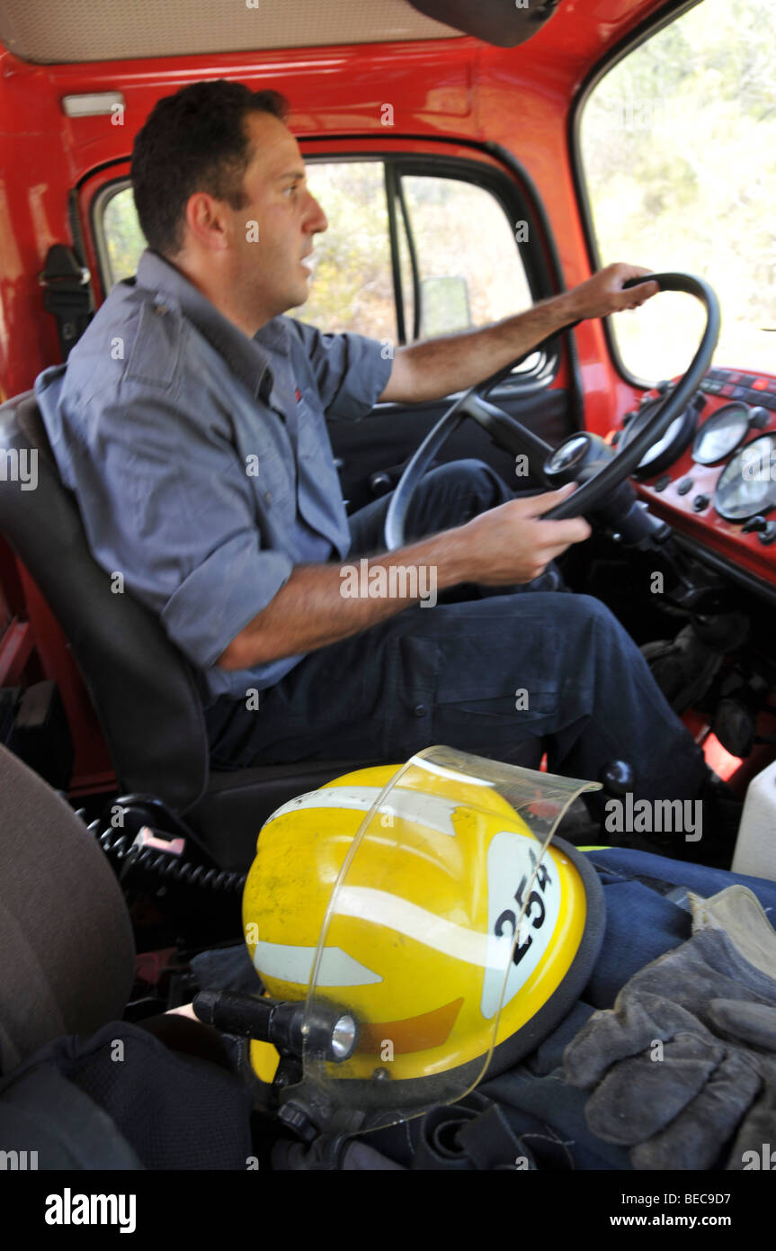 Israel, Carmel Mountain, Shekef Forest, Fire fighter driving a fire ...