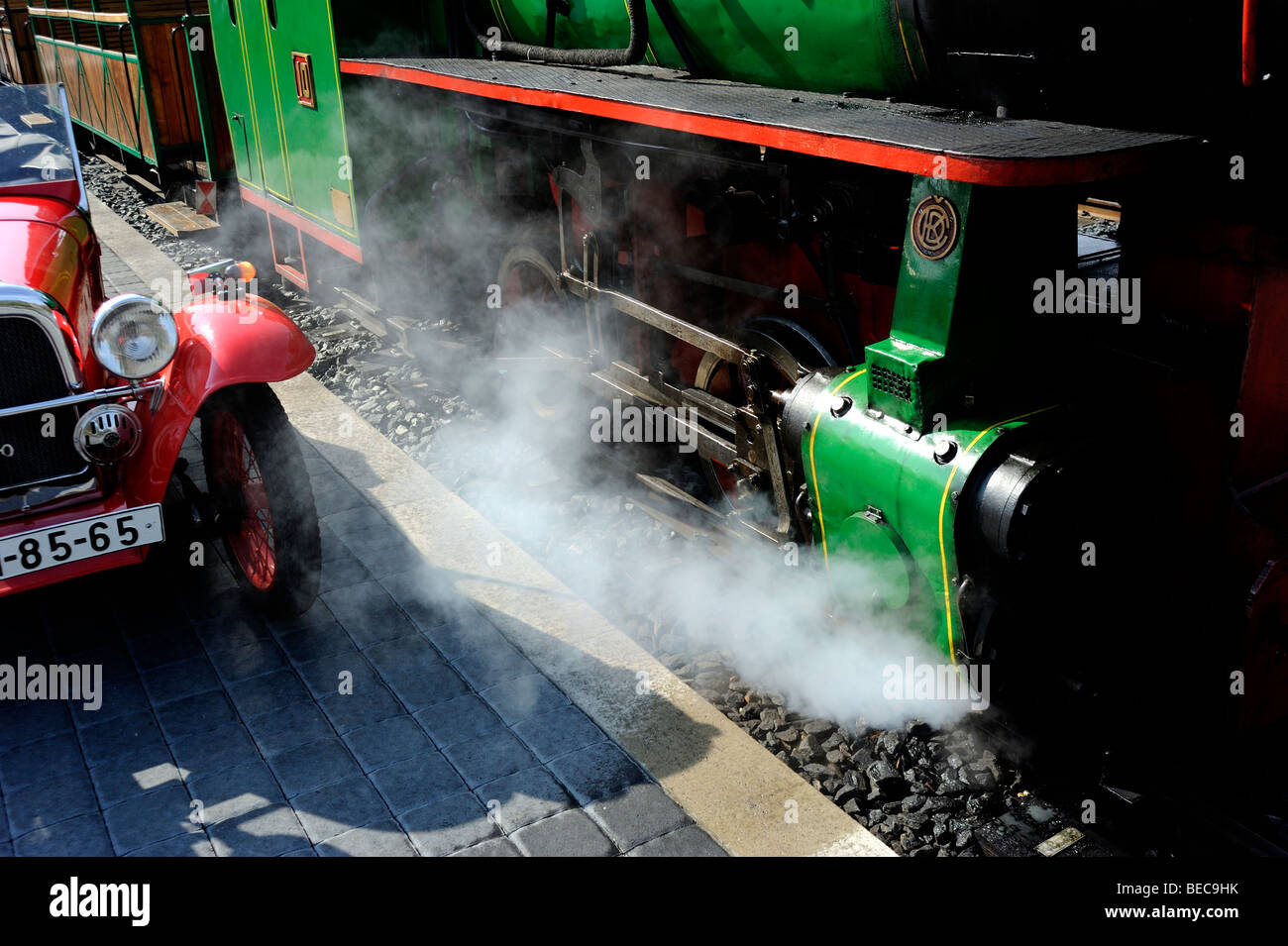 Steam Locomotive coal tank engine railway station with Aero veteran car ...