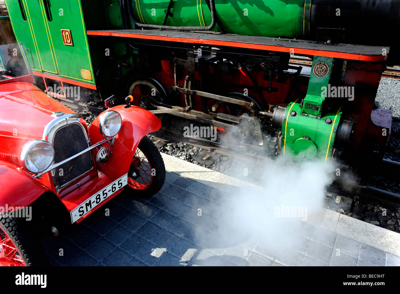 Steam Locomotive coal tank engine railway station with Aero veteran car ...