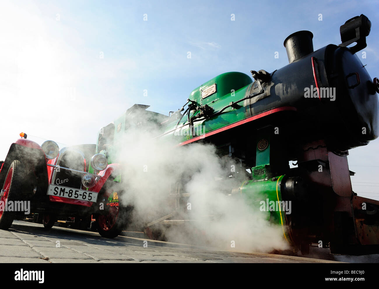 Steam Locomotive coal tank engine railway station with Aero veteran car ...