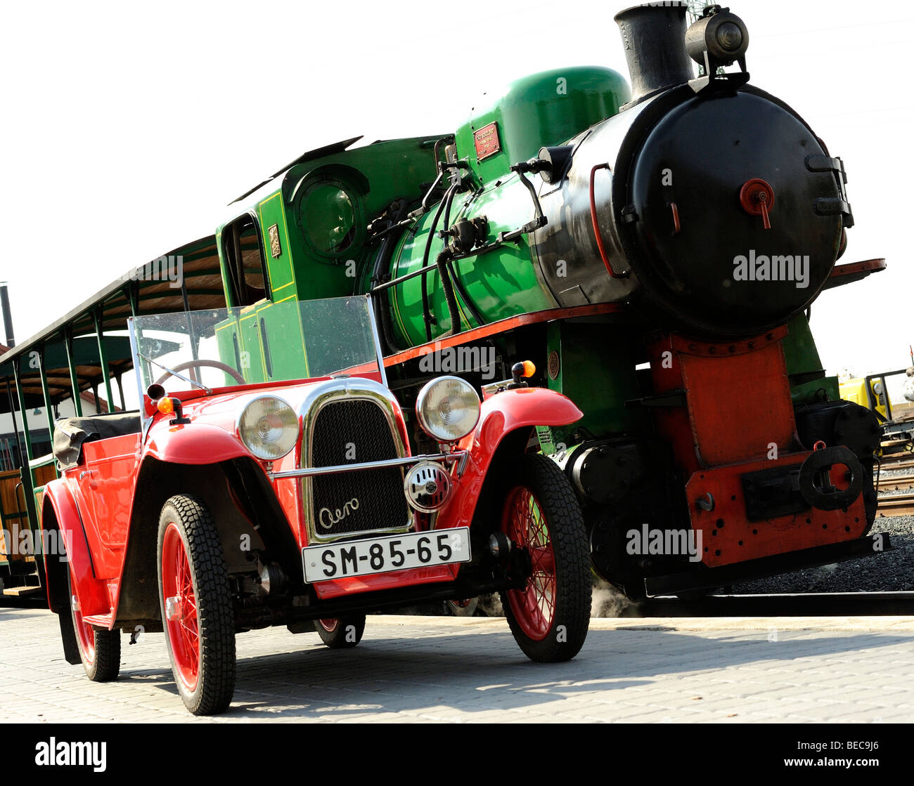 Steam Locomotive coal tank engine railway station with Aero veteran car ...