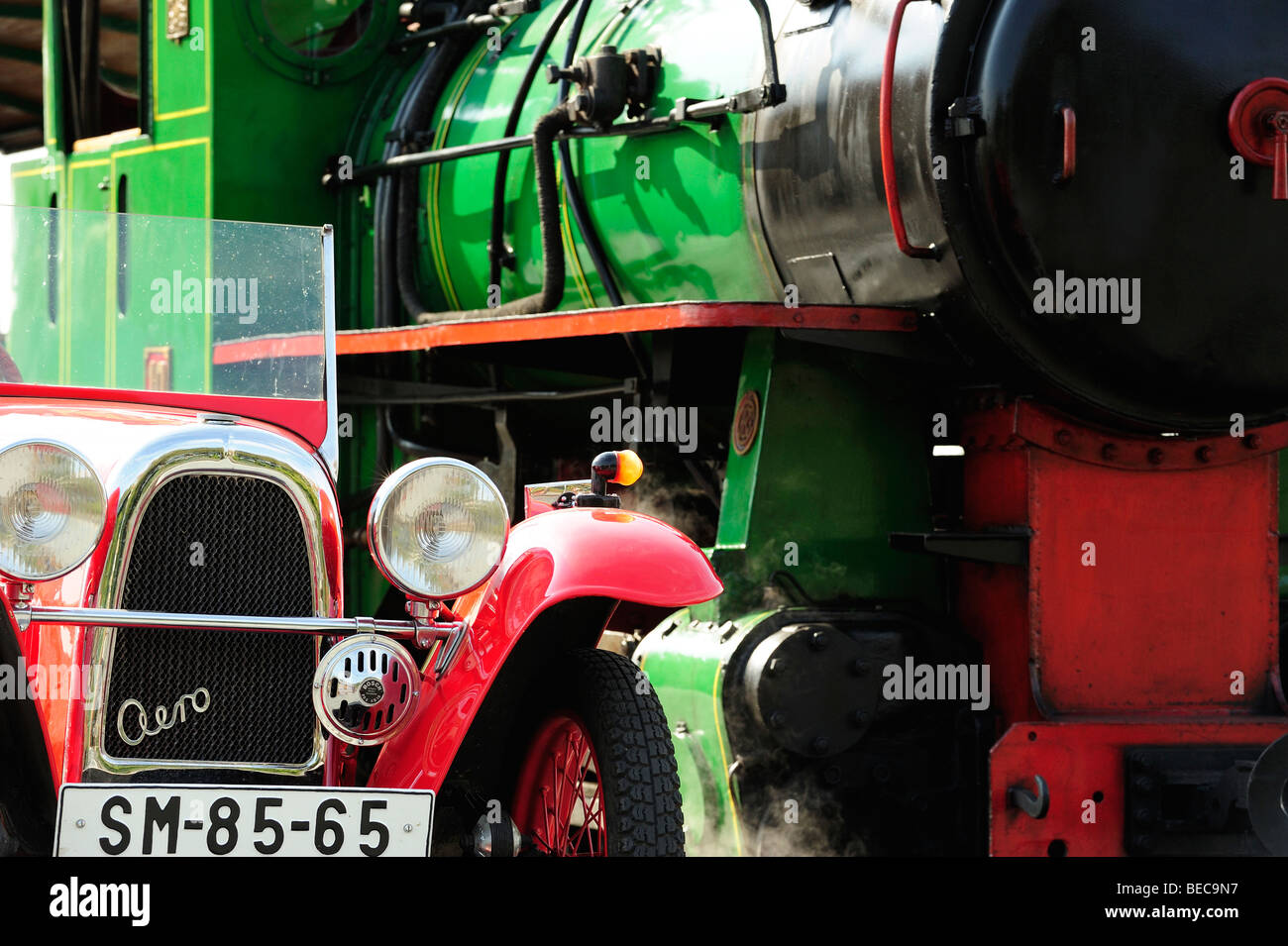 Steam Locomotive coal tank engine railway station with Aero veteran car ...