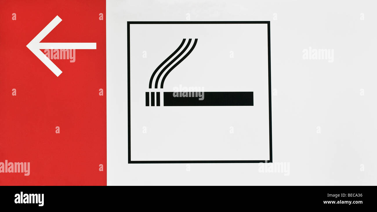 Smoking area on the left, sign with pictogram and arrow on a red ...