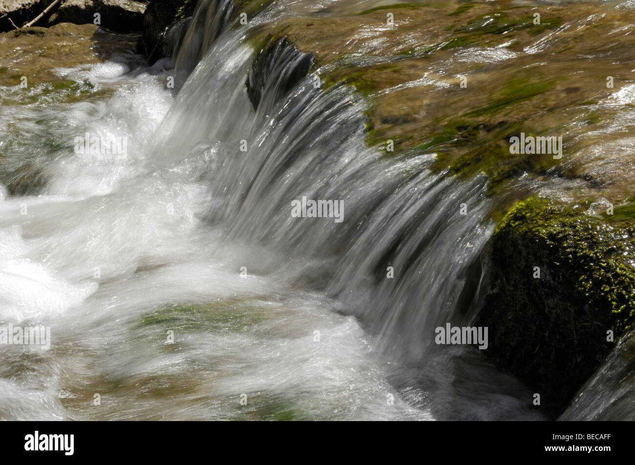 Small waterfall, running water, close-up Stock Photo - Alamy