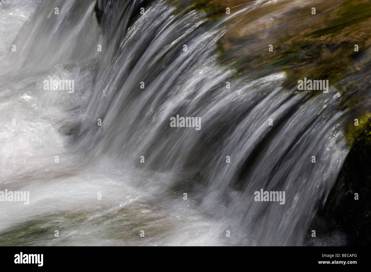 Small waterfall, running water, close-up Stock Photo - Alamy