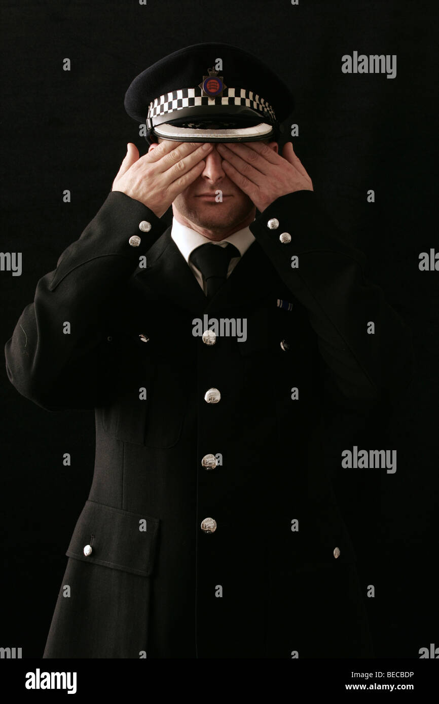 British Policeman on plain background Stock Photo - Alamy