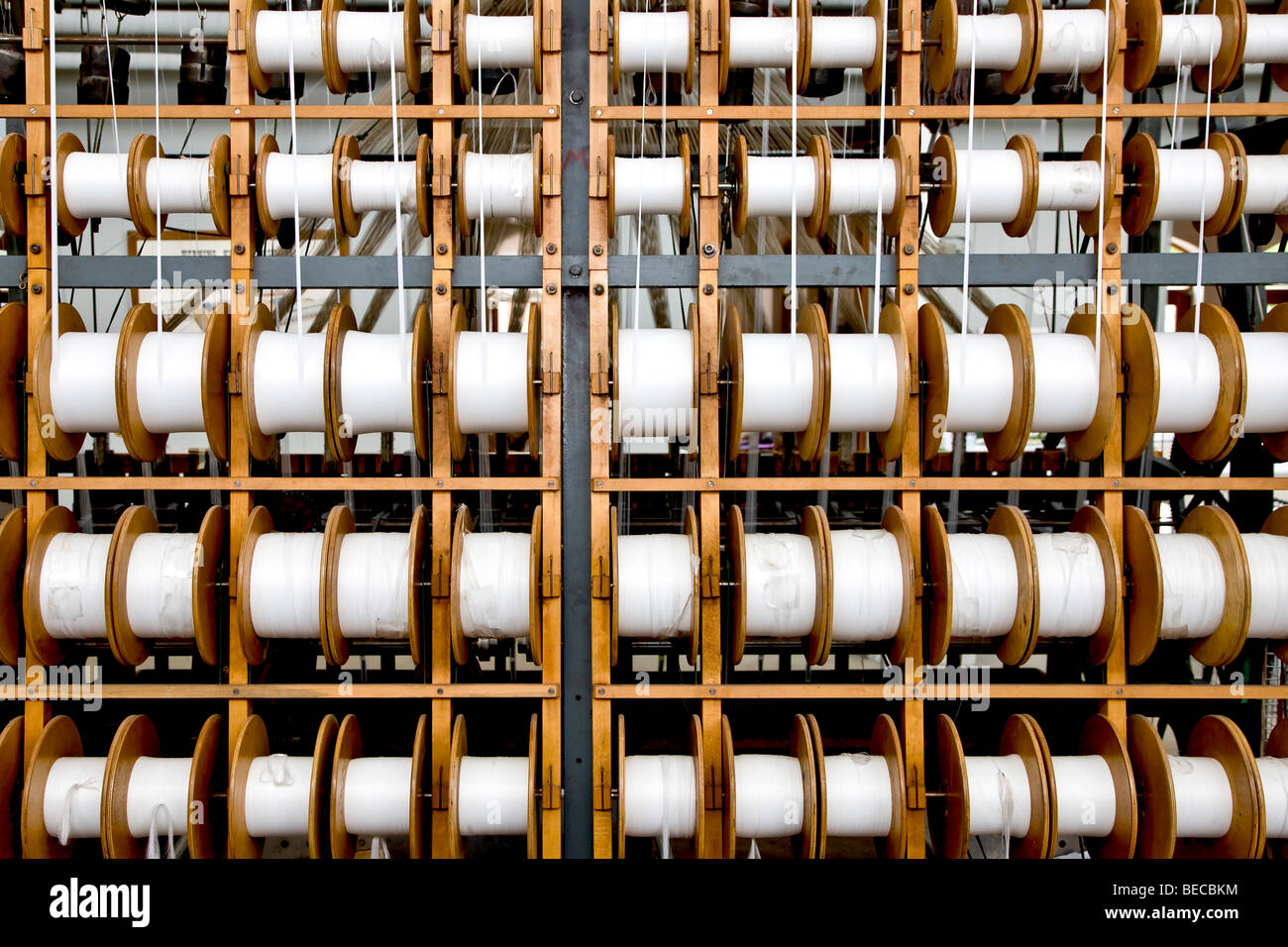 Industrial yarn spools Stock Photo - Alamy