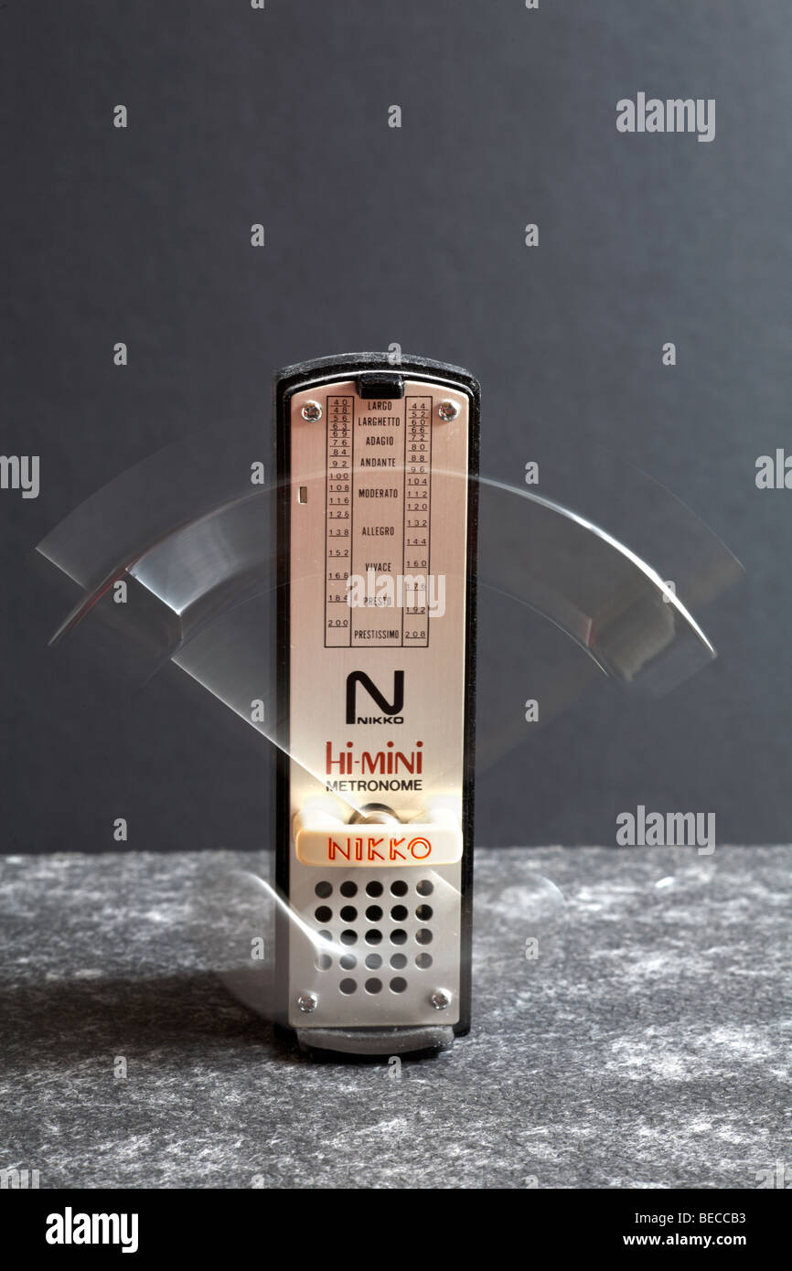Nikko Hi-Mini Music Metronome - Metronome in motion Stock Photo - Alamy