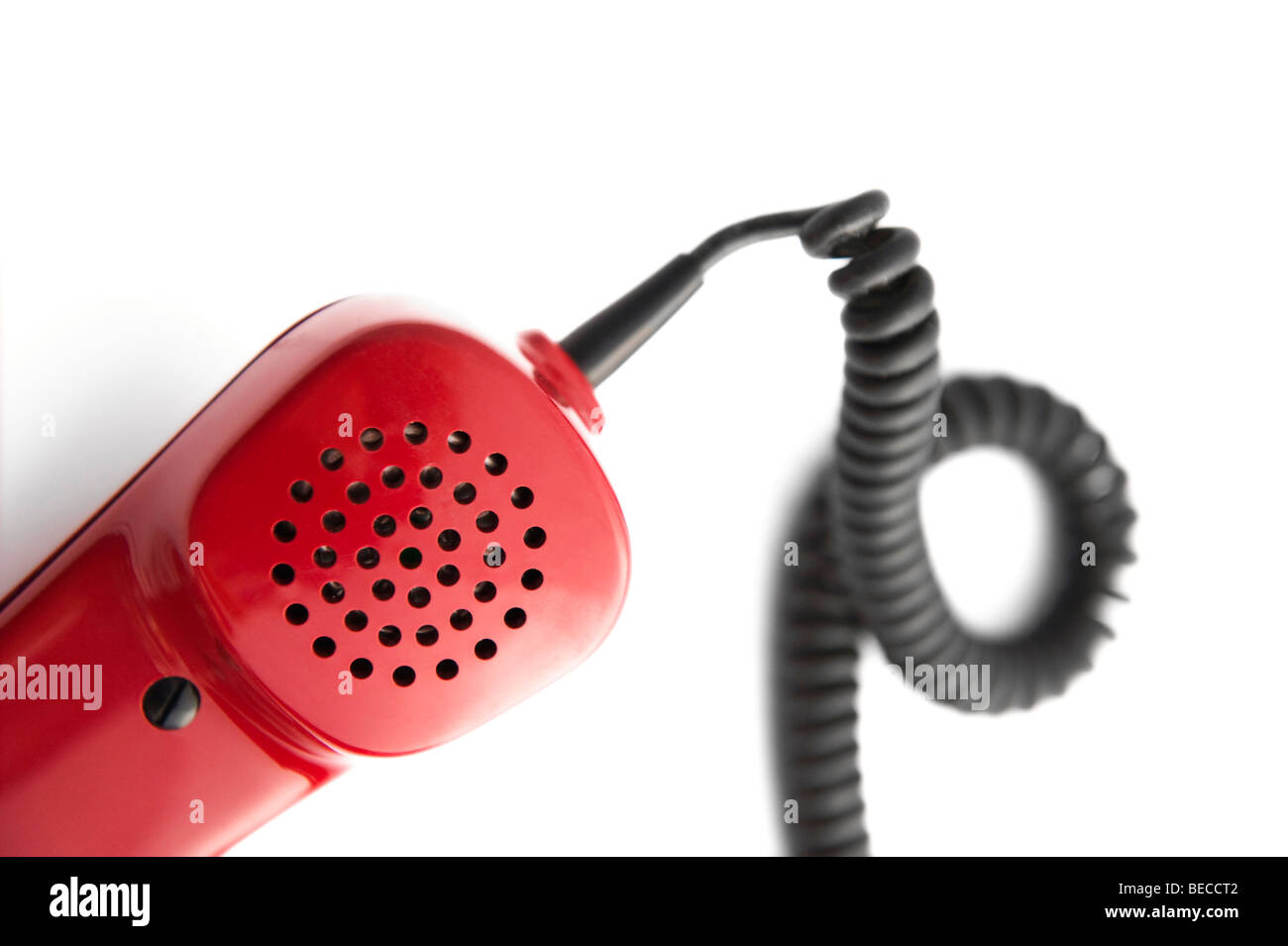 Detail of a red telephone receiver Stock Photo - Alamy