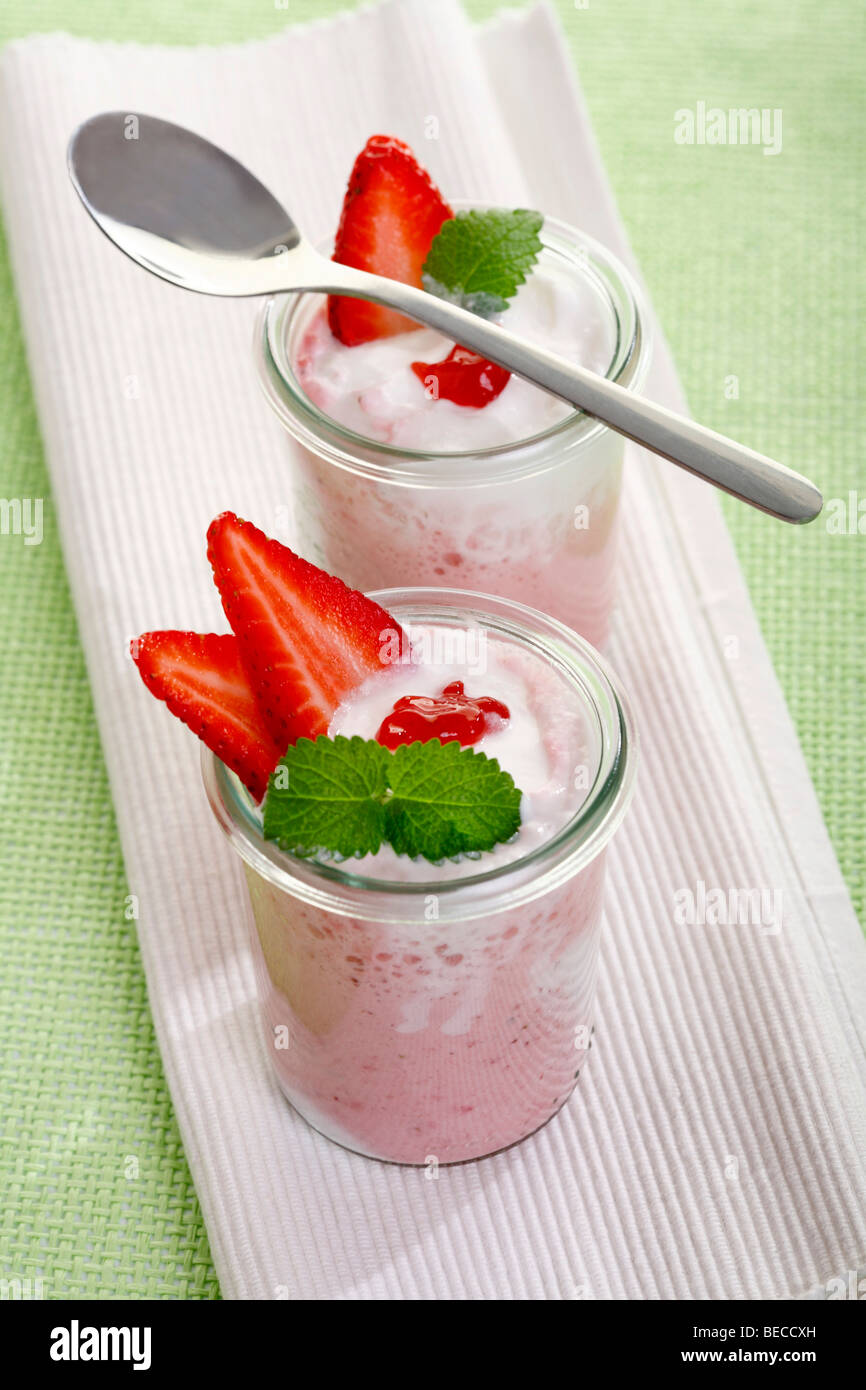 Strawberry quark, yoghurt with fresh strawberries and mint Stock Photo ...