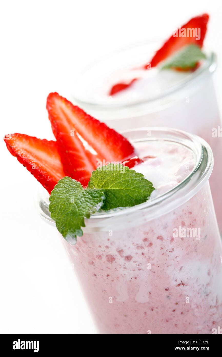 Strawberry quark, yoghurt with fresh strawberries and mint Stock Photo ...