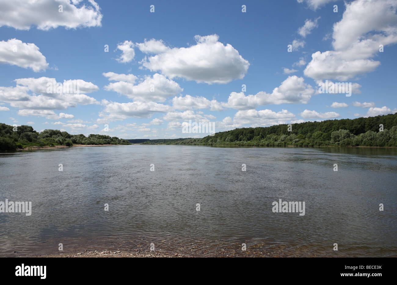 Clouds over river Stock Photo - Alamy