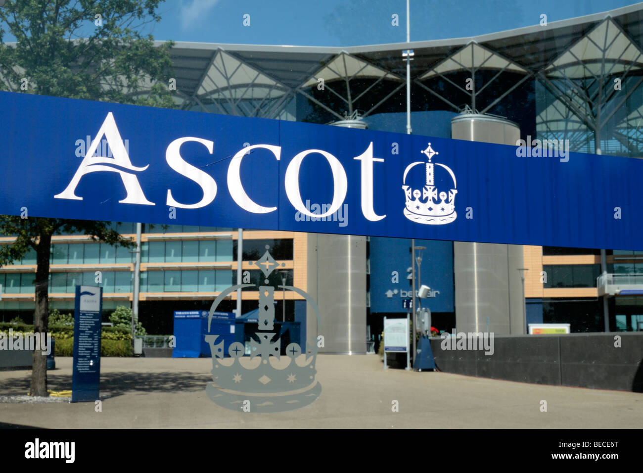 View through a glass panel with the 'Ascot' name and logo towards the ...