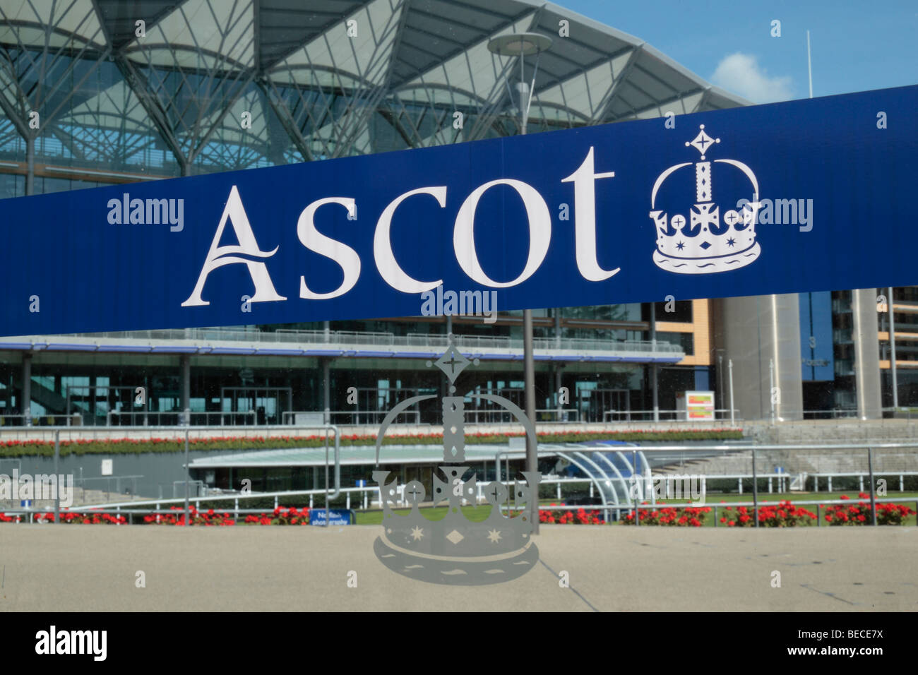 View through a glass panel with the 'Ascot' name and logo towards the ...